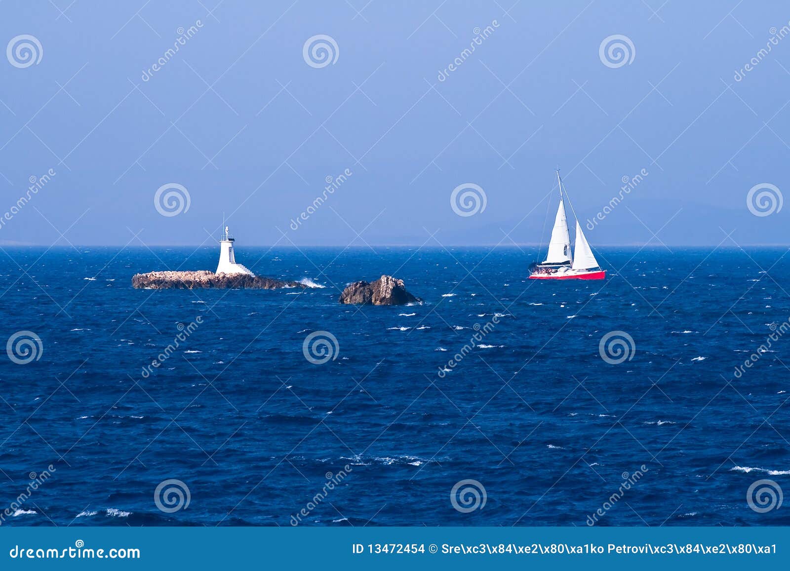 Lighthouse and sailboat stock photo. Image of gust, vessel - 13472454