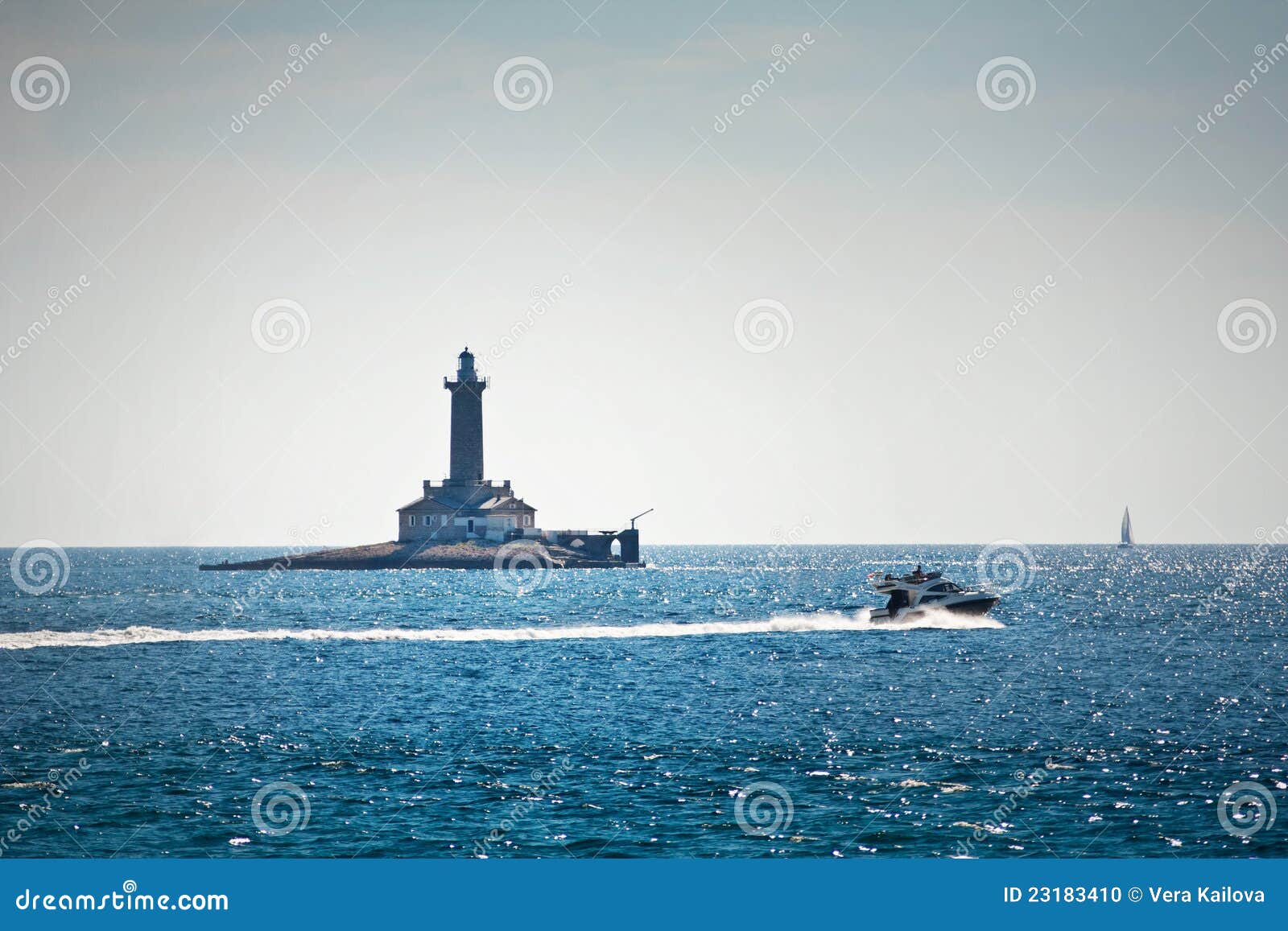 The lighthouse in the sea stock photo. Image of blue - 23183410