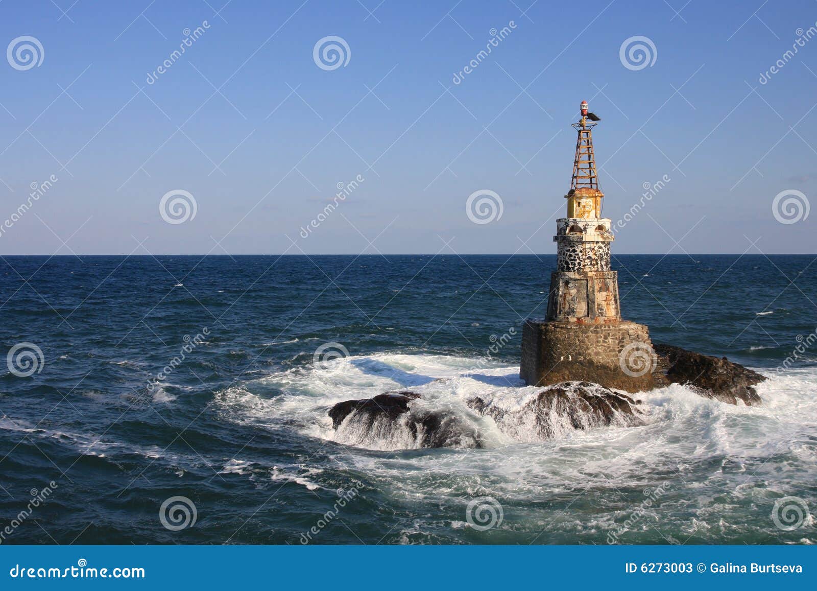 The lighthouse in the sea. stock image. Image of horizon - 6273003