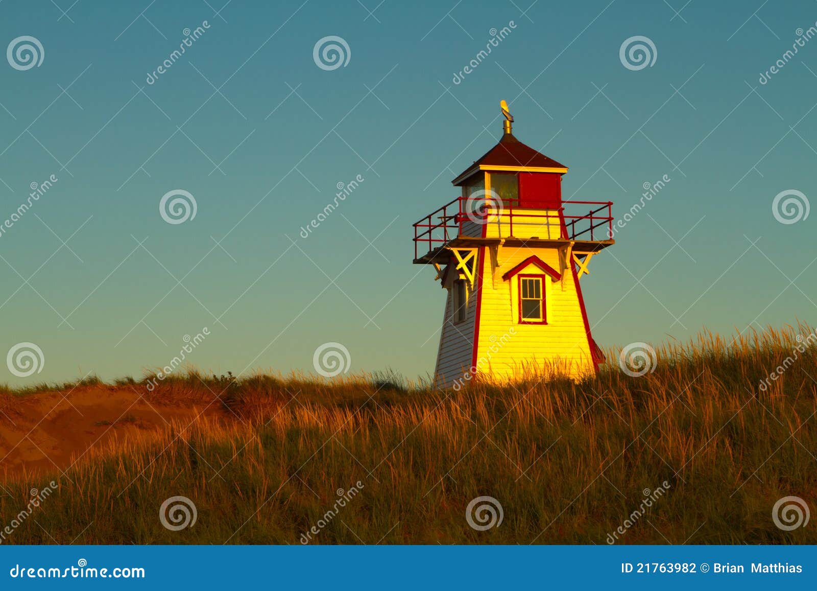 Lighthouse in Setting Sun stock photo. Image of island - 21763982