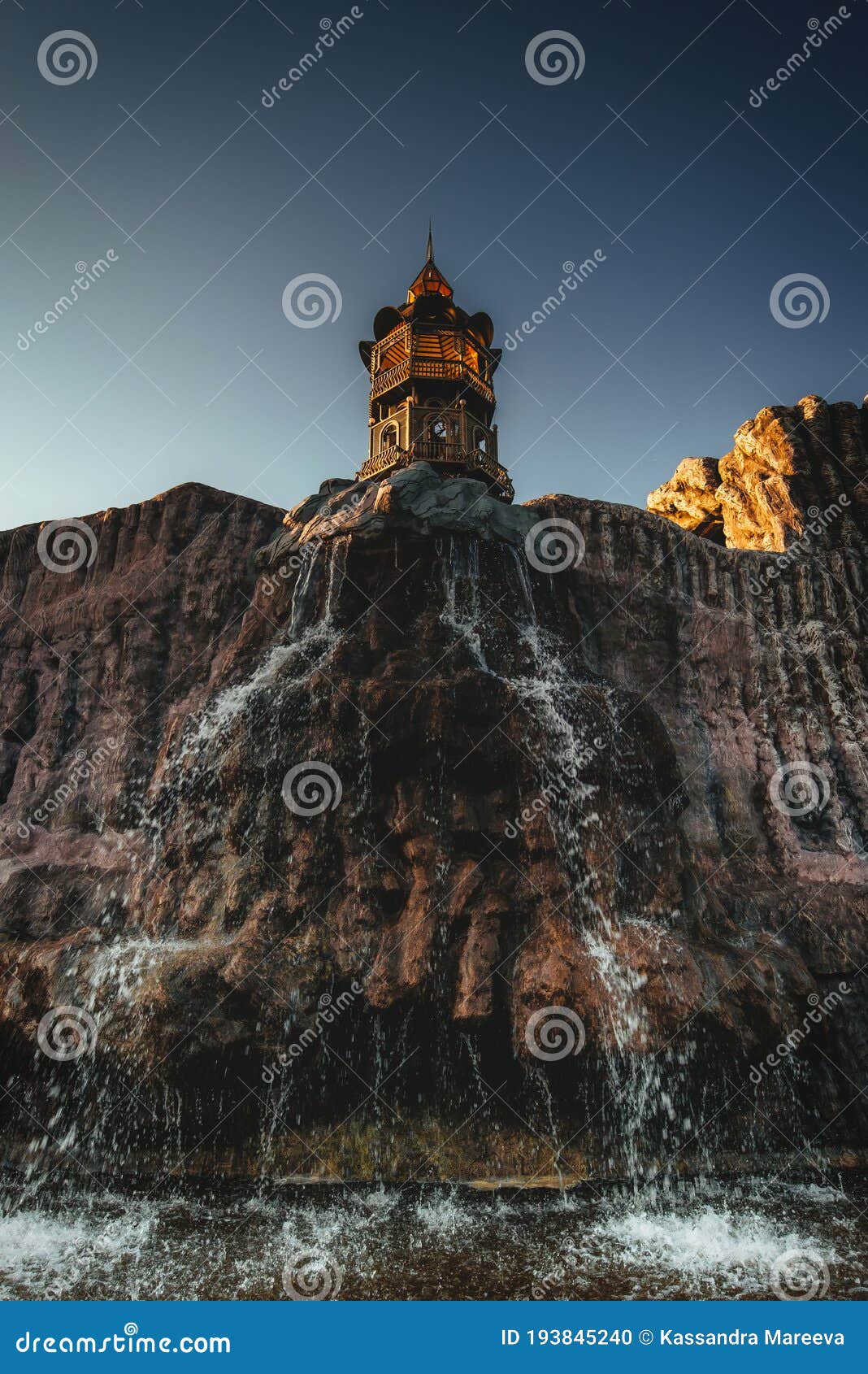 A Lighthouse in the Setting Sun. a Lighthouse and an Abandoned Ship in ...