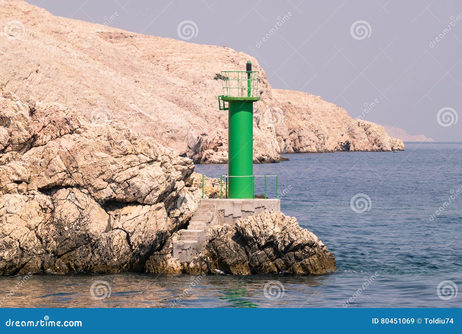 Lighthouse that Signals the Presence of Rocks at Ships. Stock Image ...