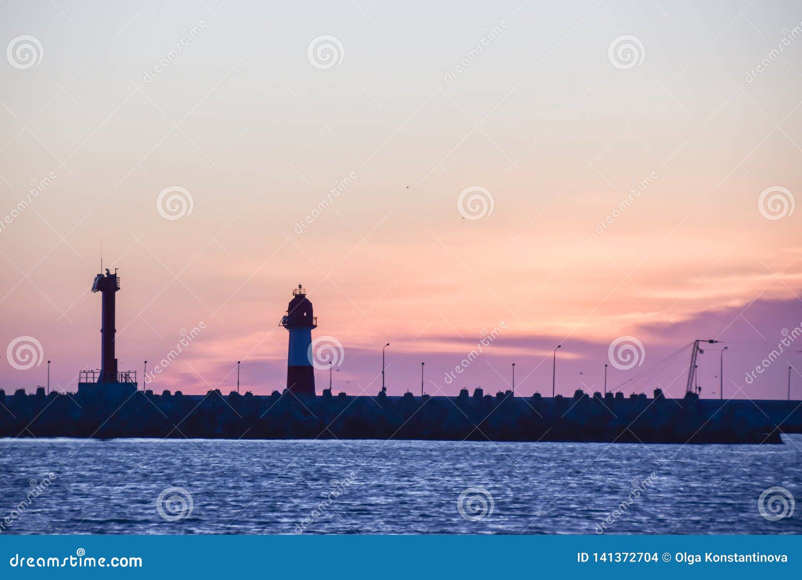 Lighthouse Silhouette and Setting Sun Sunset Red Sky Clouds Stock Photo ...