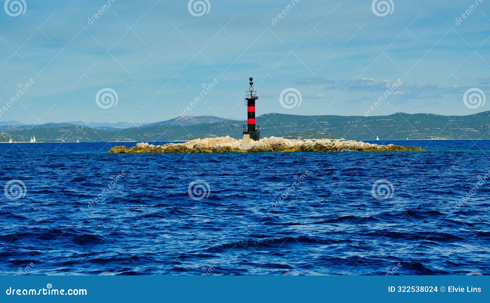 Lighthouse And Small Boats On Caleta Beach In Acapulco Mexico Editorial ...