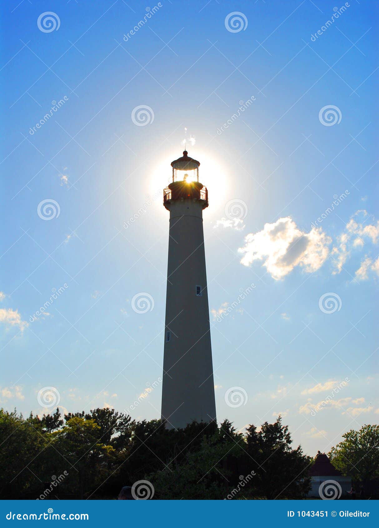 Lighthouse and sun stock image. Image of cape, lantern - 1043451