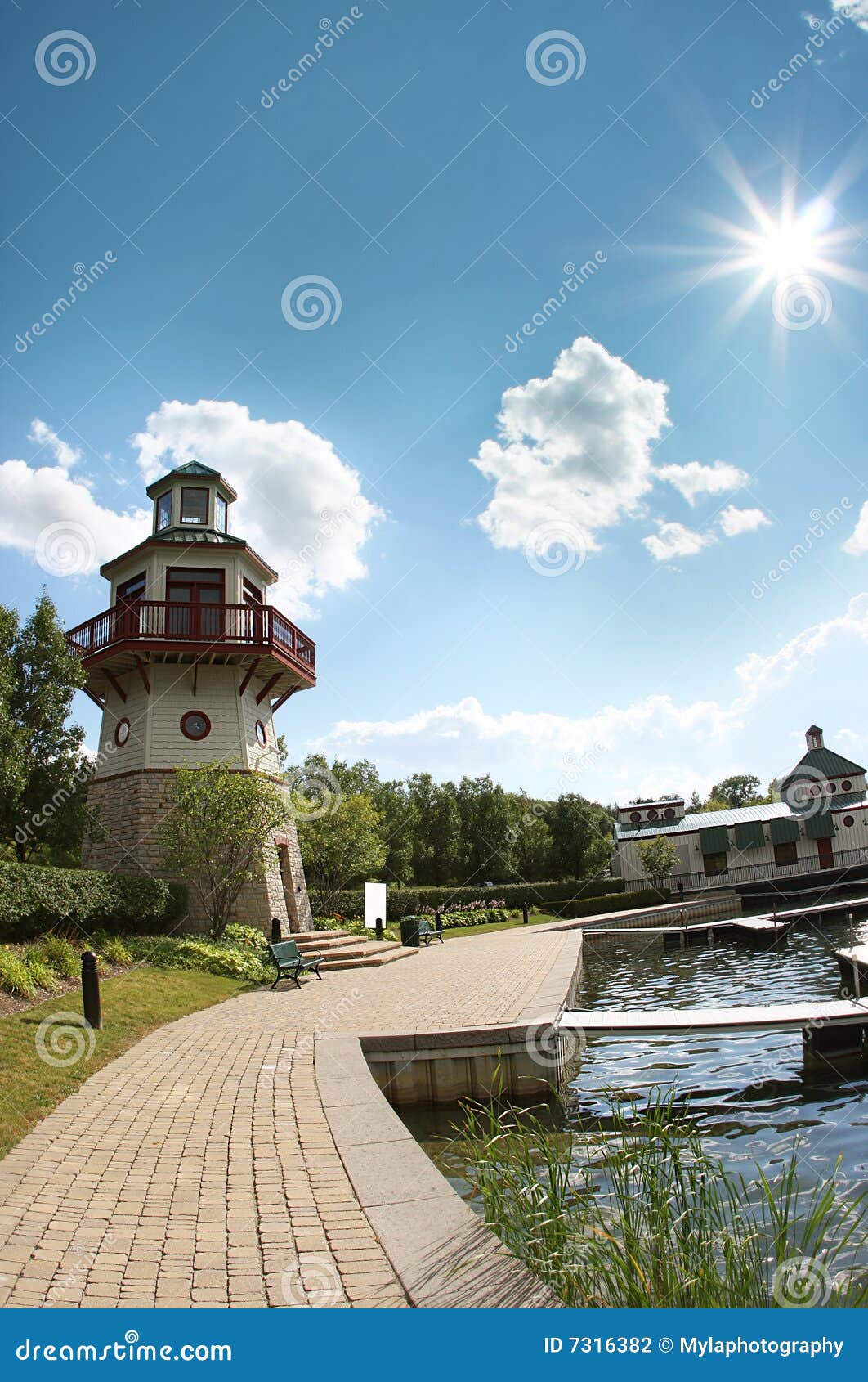 Lighthouse and sun stock photo. Image of shore, architecture - 7316382