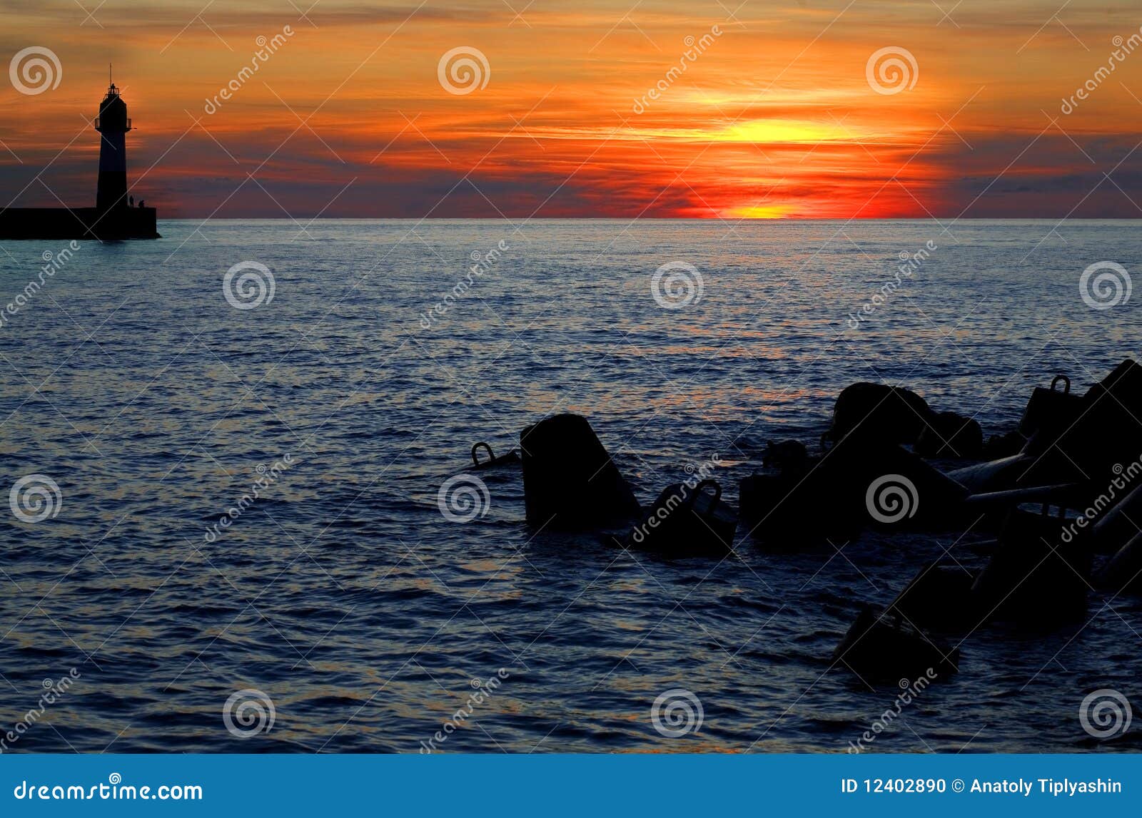 Lighthouse in sunrise stock photo. Image of sunrise, sunset - 12402890