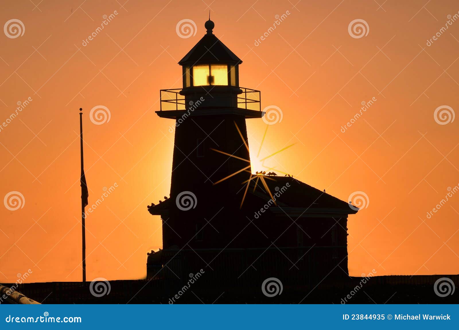 Lighthouse at Sunrise stock image. Image of morning, gold - 23844935