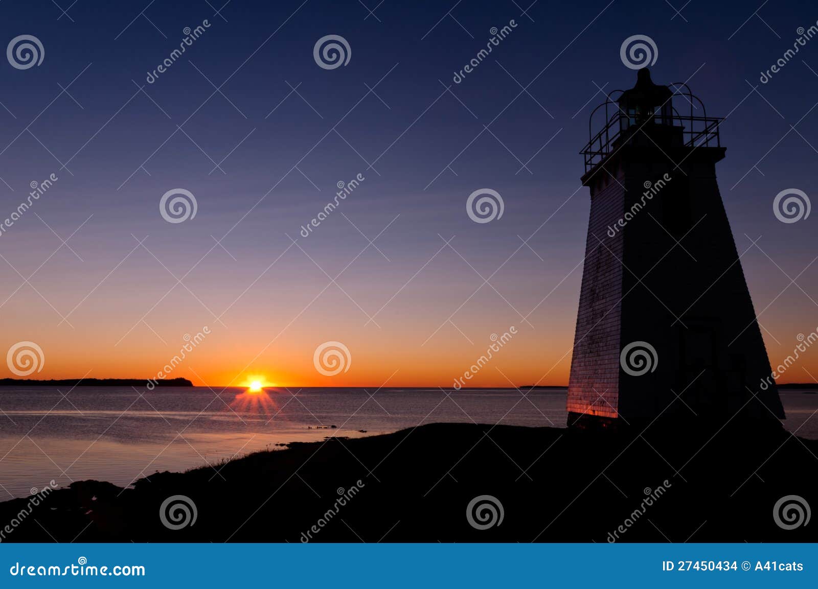 Lighthouse during Sunrise in the Early Morning Stock Photo - Image of ...