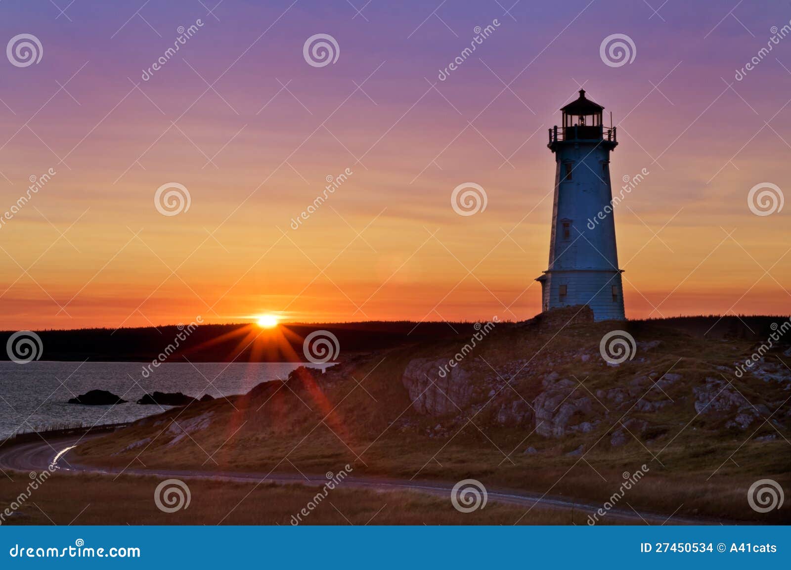 Lighthouse during Sunrise in the Early Morning Stock Photo - Image of ...
