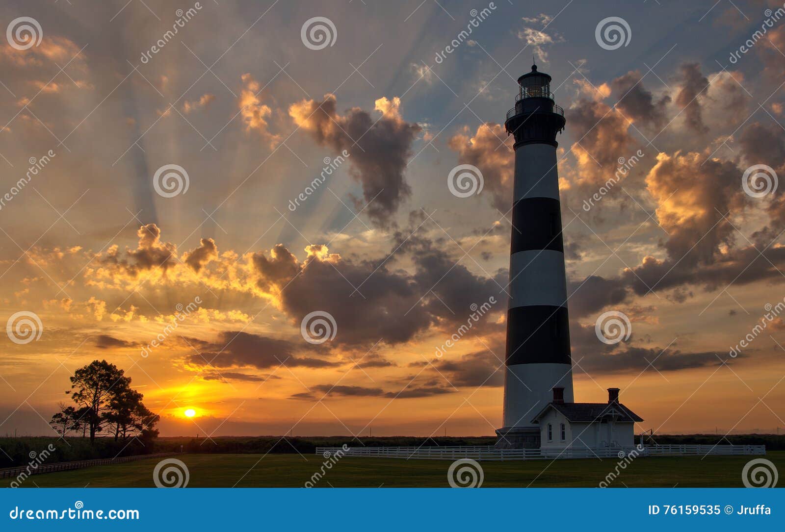 Lighthouse sunrise stock image. Image of dawn, foggy - 76159535