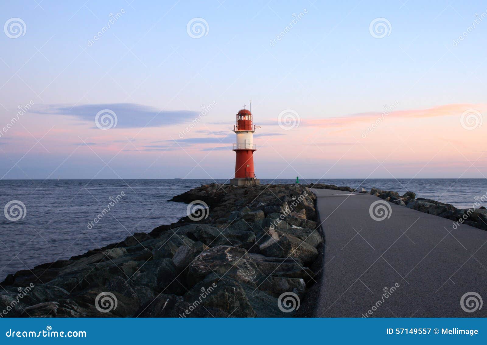 Lighthouse at sunrise stock image. Image of pink, east - 57149557