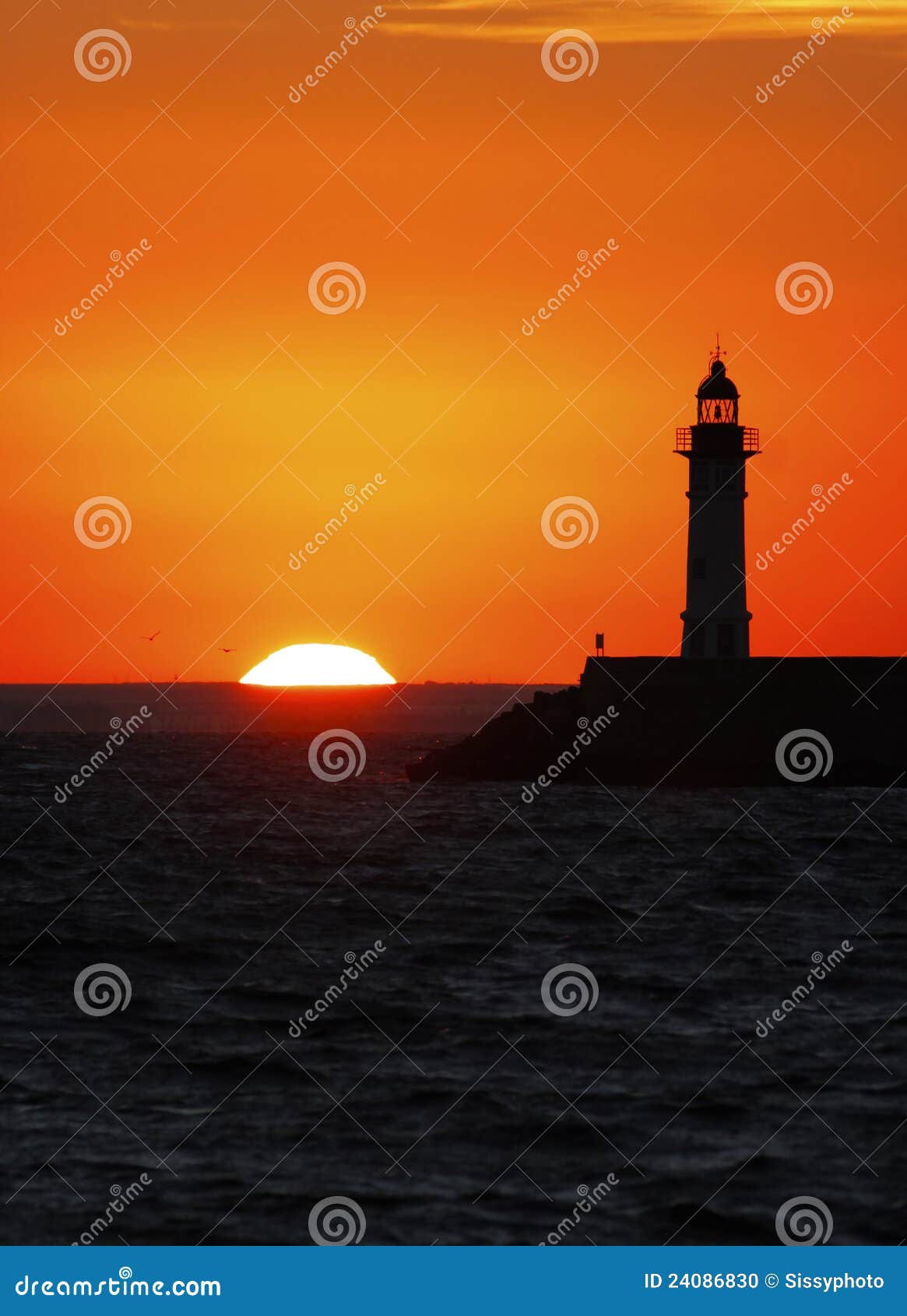 Lighthouse at sunset stock photo. Image of sphere, beauty - 24086830
