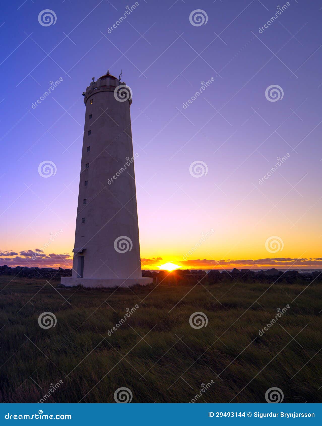A lighthouse and a sunset stock photo. Image of canadian - 29493144