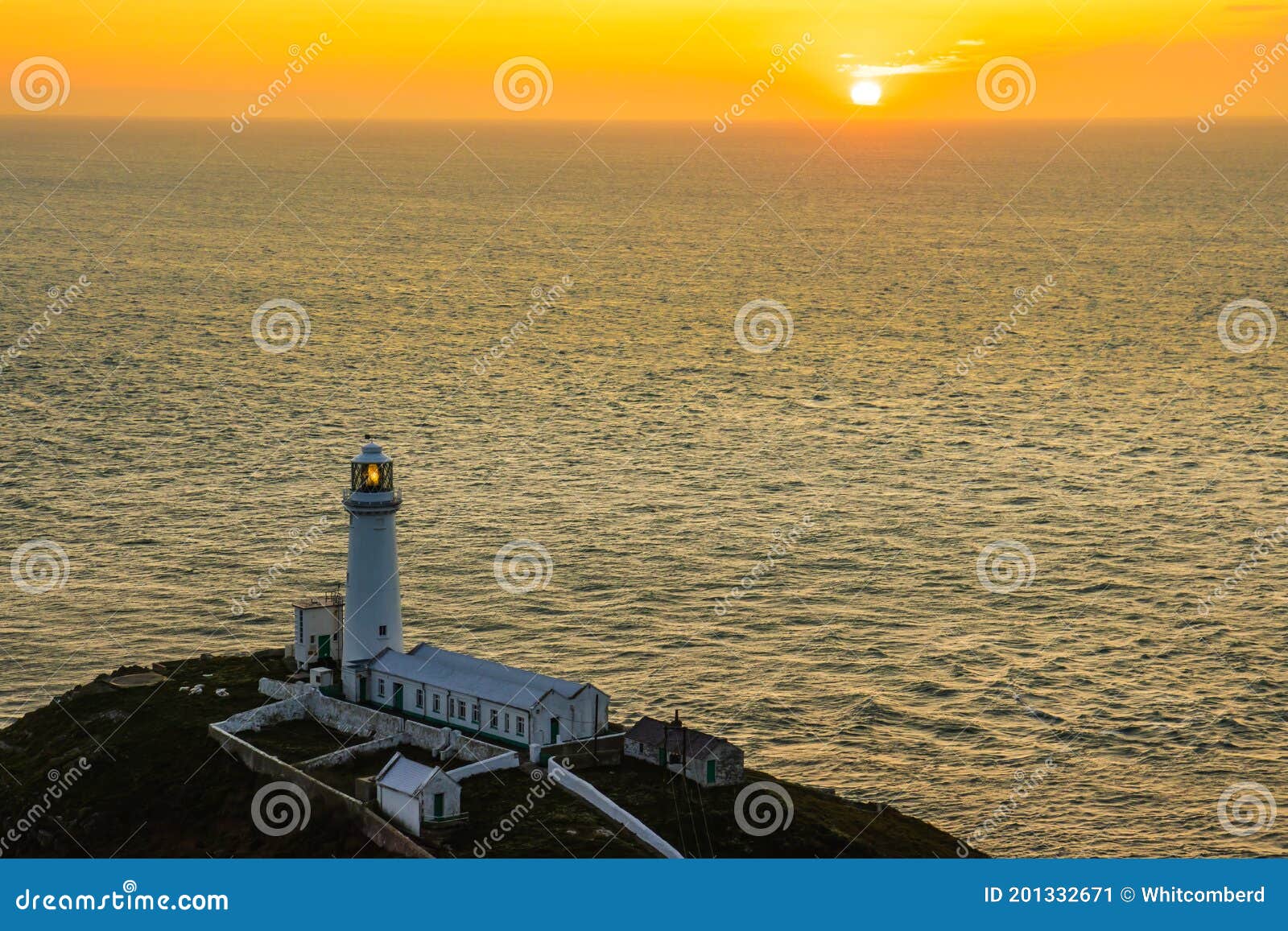 Lighthouse at sunset stock image. Image of landscape - 201332671
