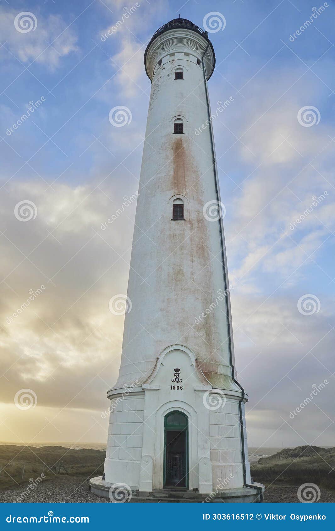 Lighthouse at Sunset in Coastal City Hvide Sande Denmark Stock Photo ...