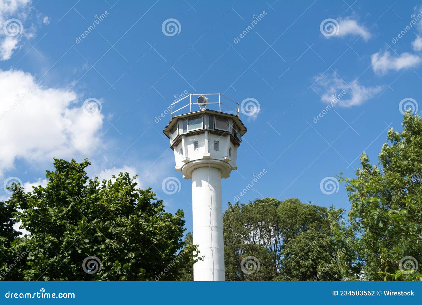 Lighthouse Surrounded by Trees on a Sunny Day Stock Photo - Image of ...