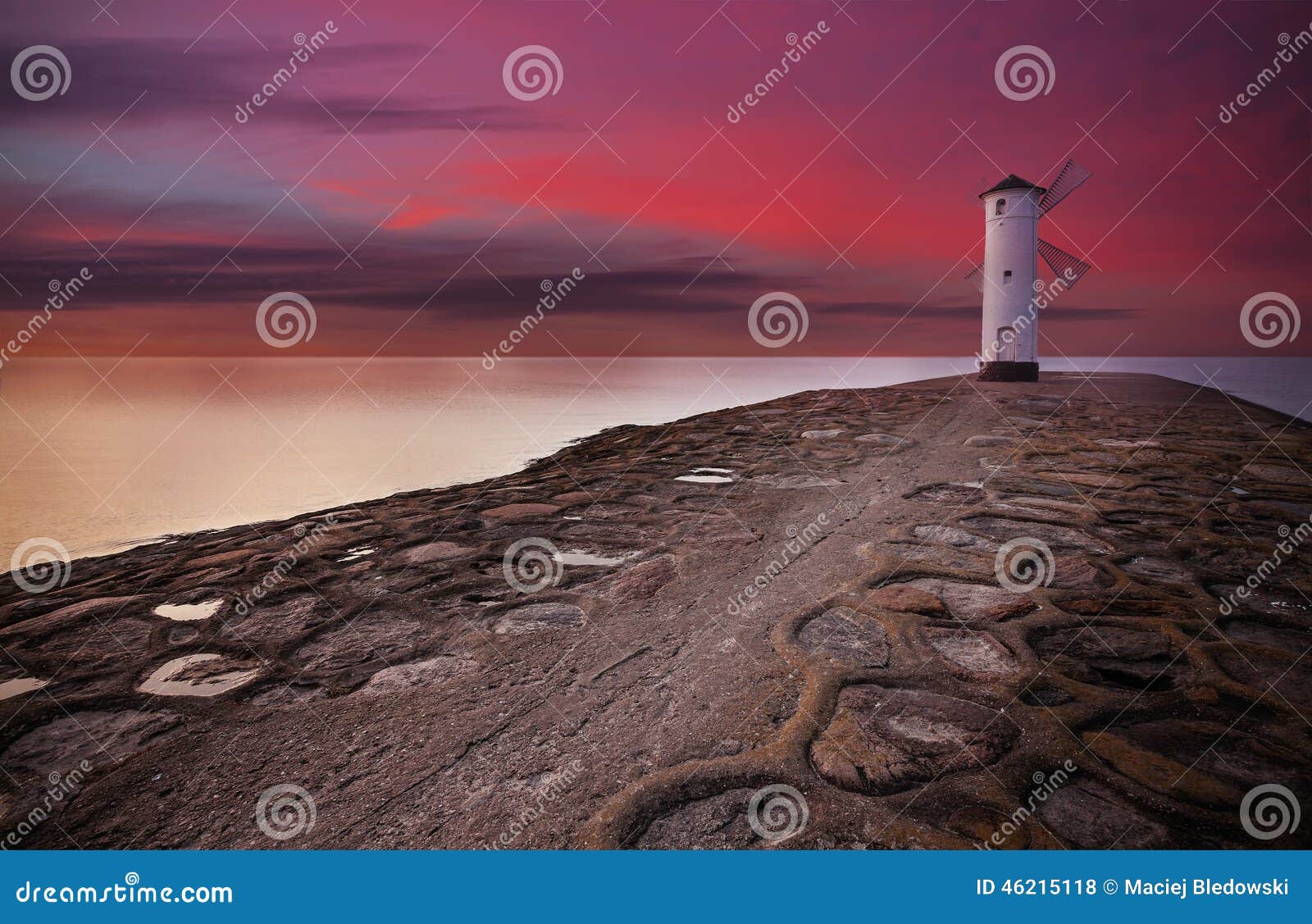 Lighthouse Windmill with Dramatic Sunset Sky Stock Photo - Image of ...