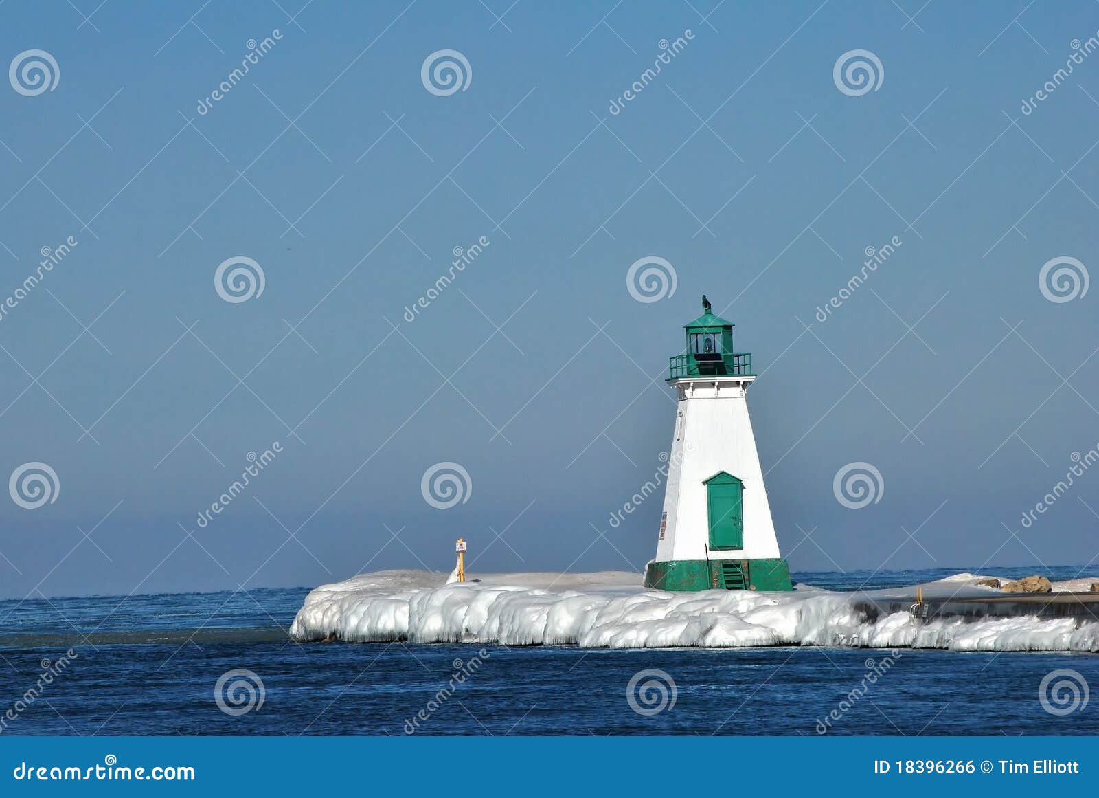Lighthouse in Winter stock photo. Image of snow, cold - 18396266