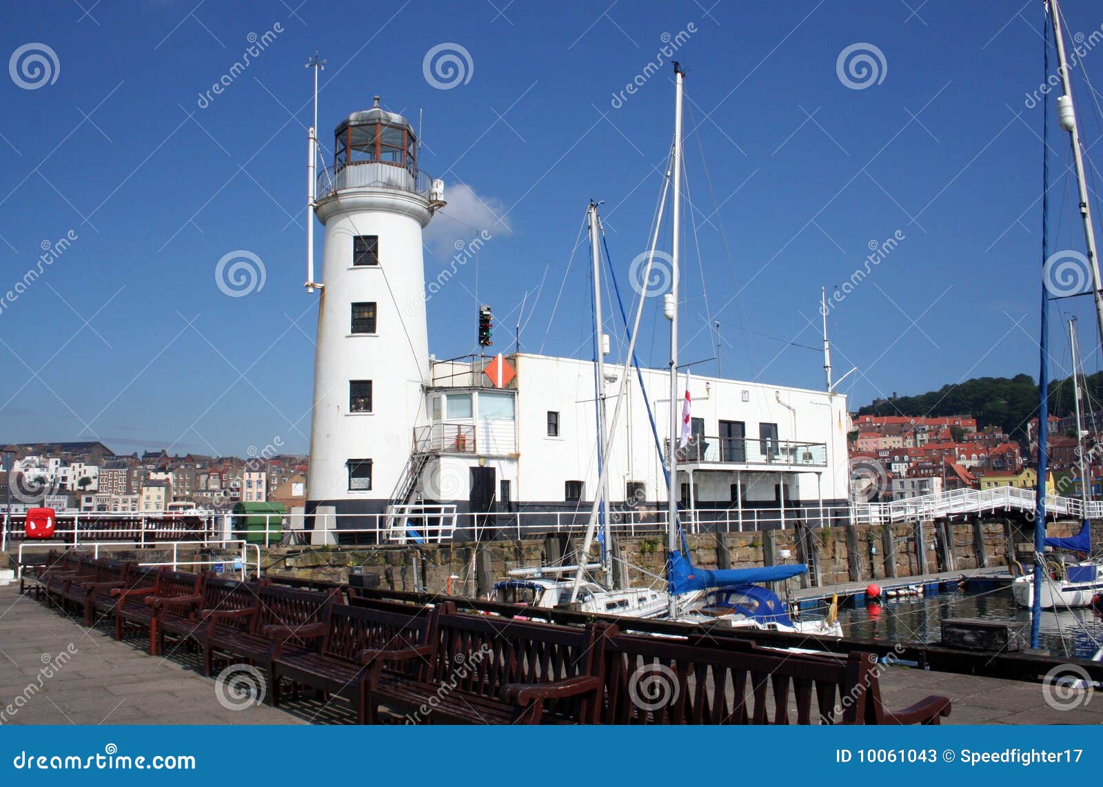 Lighthouse and Yacht Marina Stock Image - Image of vessels, resort ...