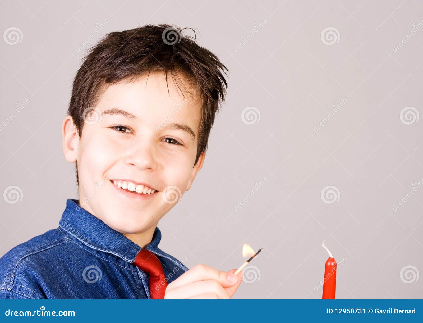 Lighting a candle stock image. Image of teens, expression - 12950731