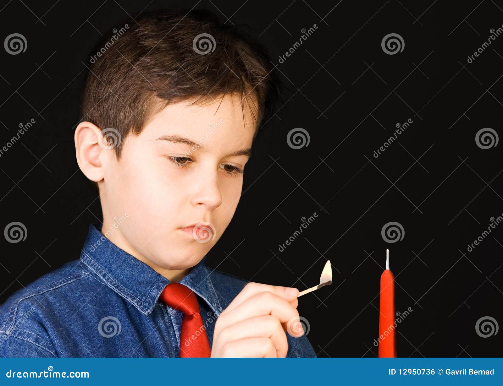 Lighting a candle stock photo. Image of brown, dager - 12950736