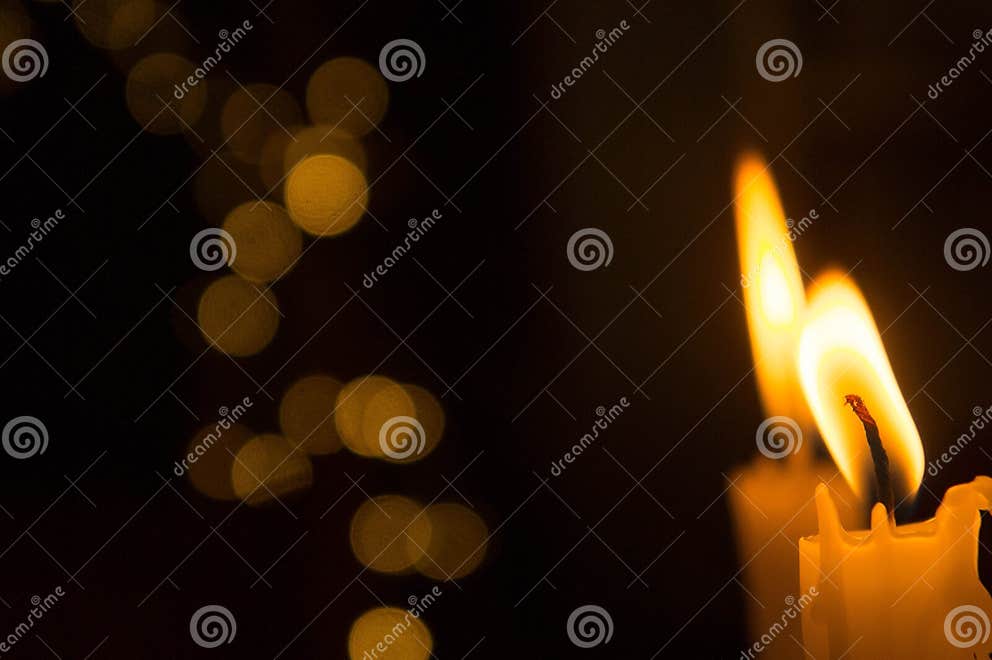 Lighting a Candle in the Night Stock Photo - Image of orange, hope ...