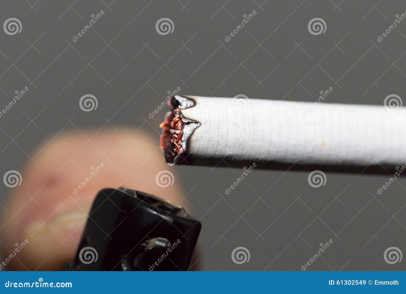 Lighting a Cigarette stock image. Image of grey, smoking - 61302549