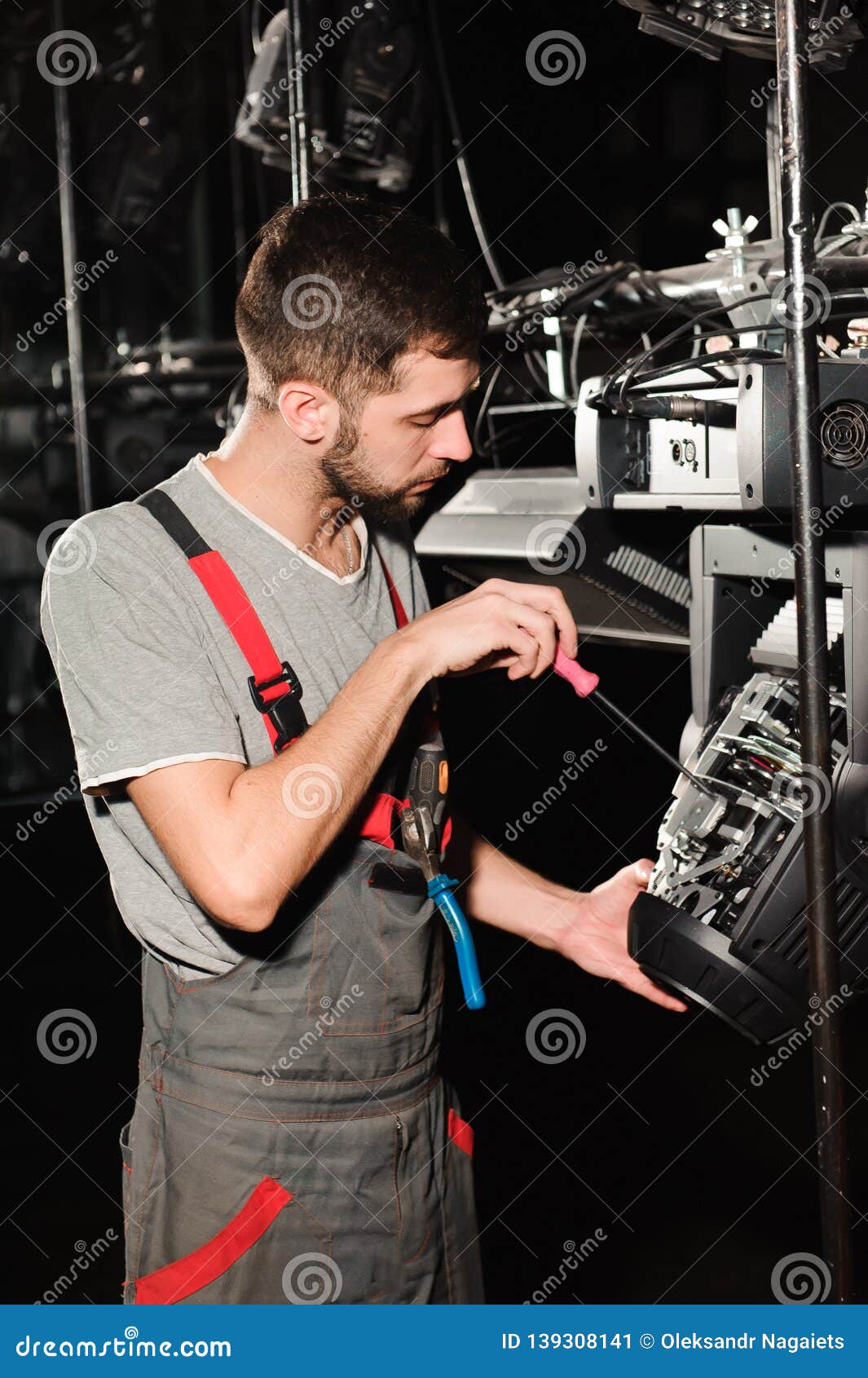 The Lighting Engineer Adjusts the Lights on the Stage Stock Image ...