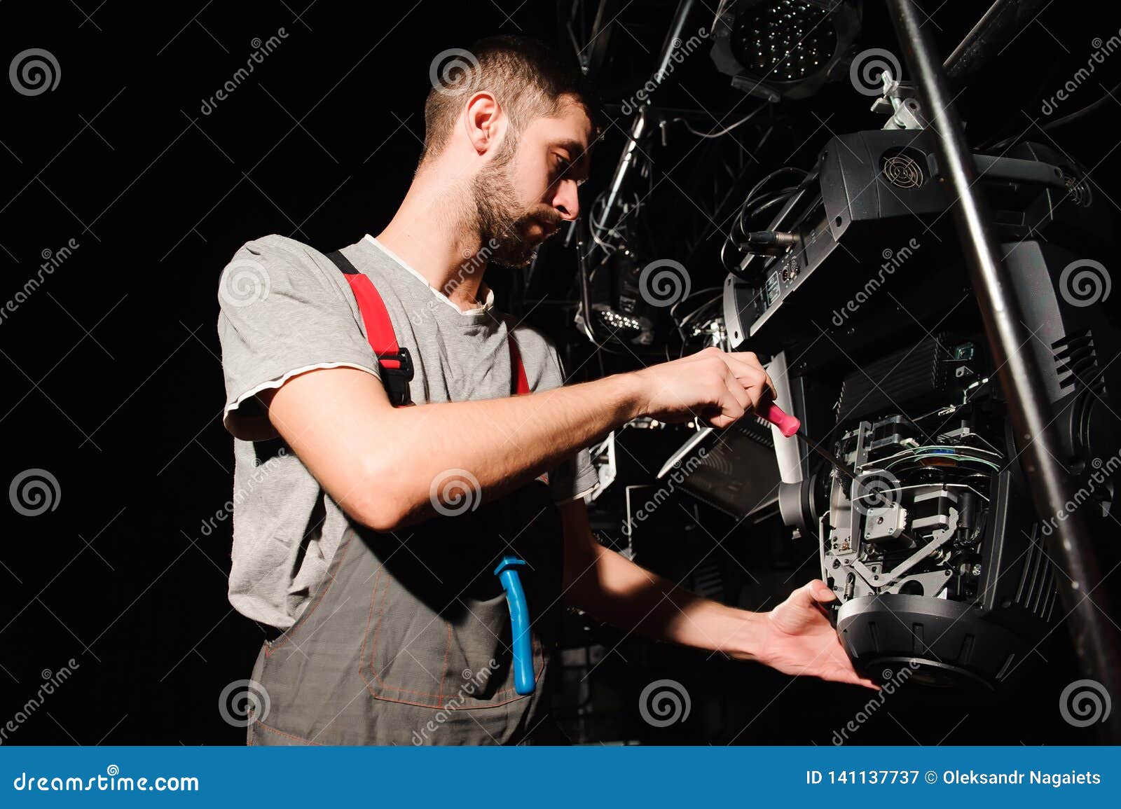 The Lighting Engineer Adjusts the Lights on the Stage Stock Image ...