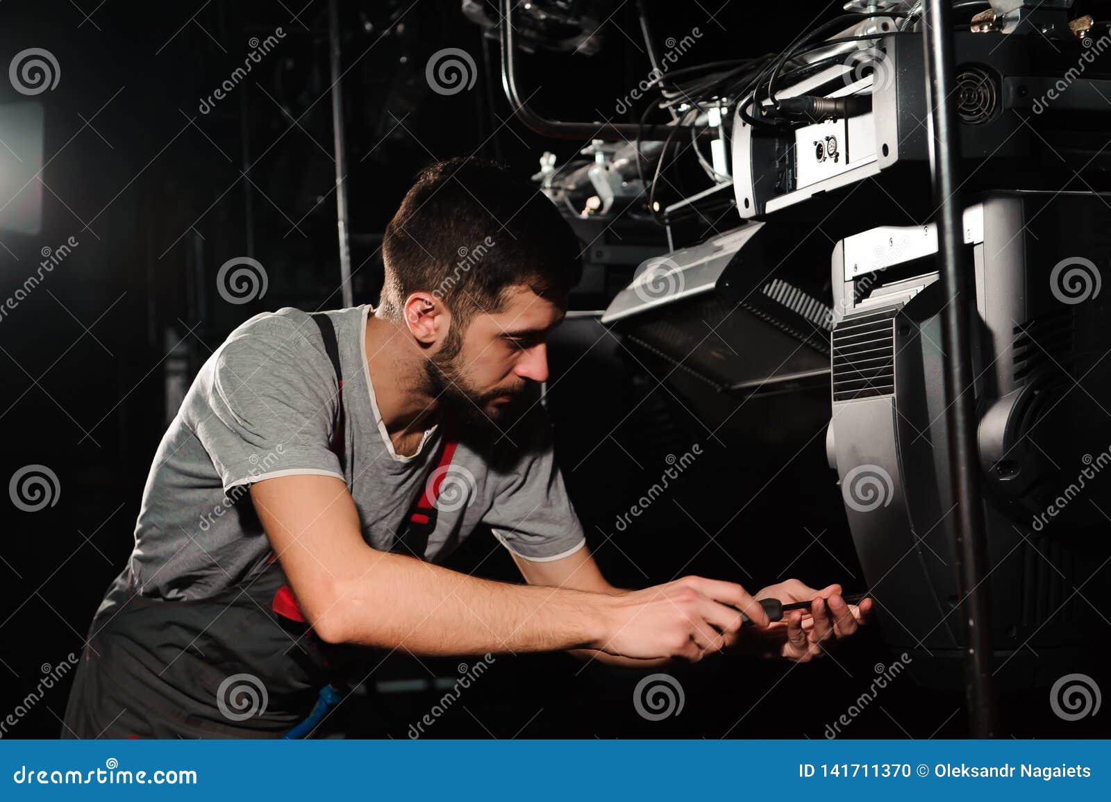 The Lighting Engineer Adjusts the Lights on the Stage Stock Photo ...