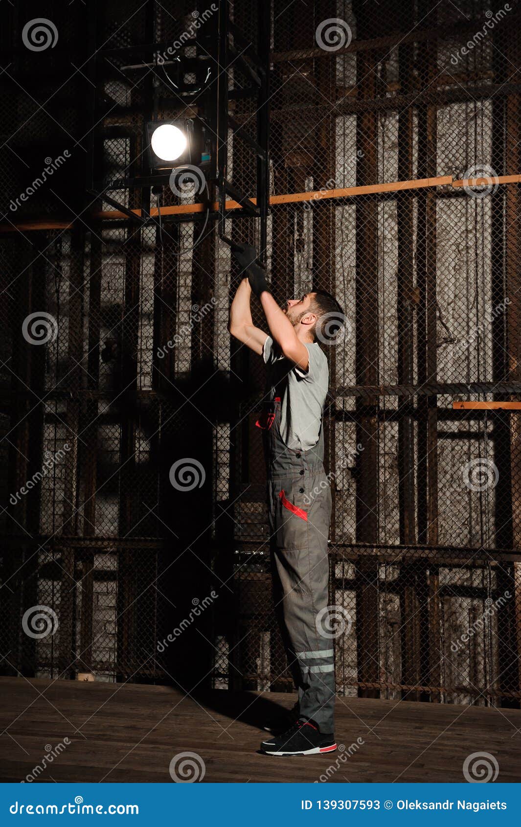 The Lighting Engineer Adjusts the Lights on Stage Stock Image - Image ...
