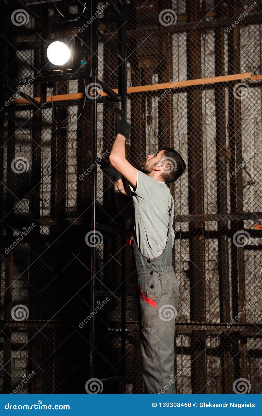 The Lighting Engineer Adjusts the Lights on Stage Stock Photo - Image ...