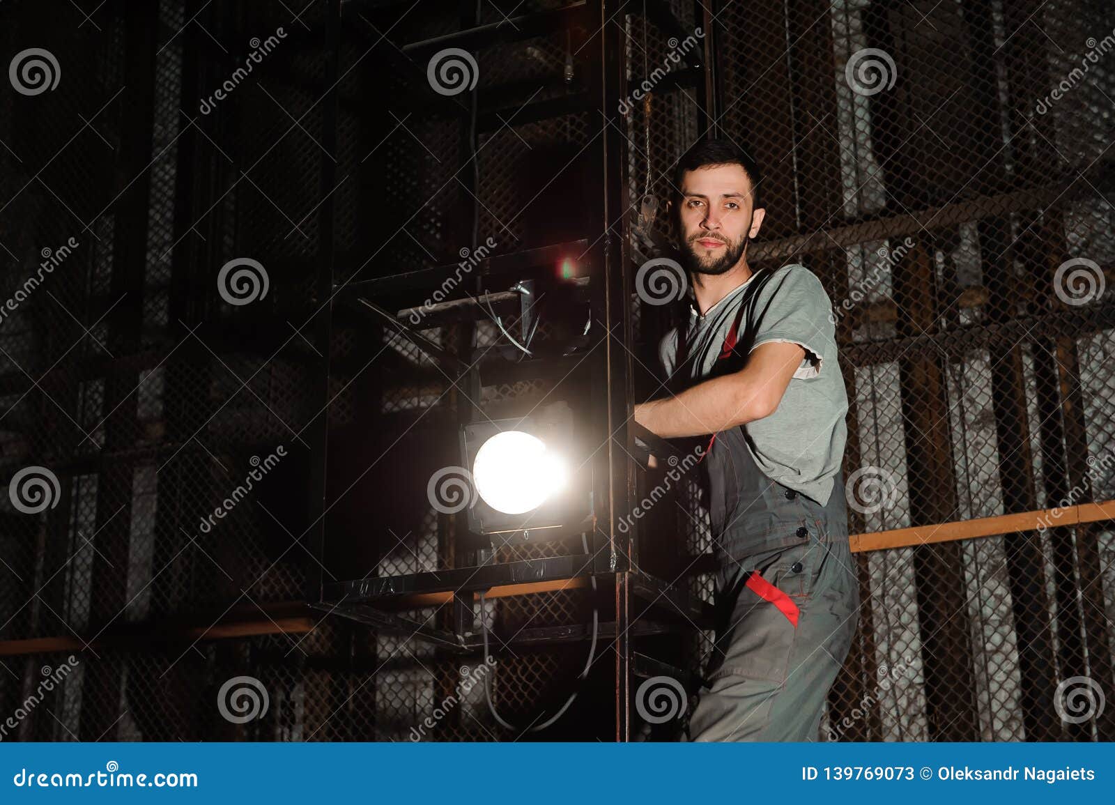 The Lighting Engineer Adjusts the Lights on Stage Stock Image - Image ...