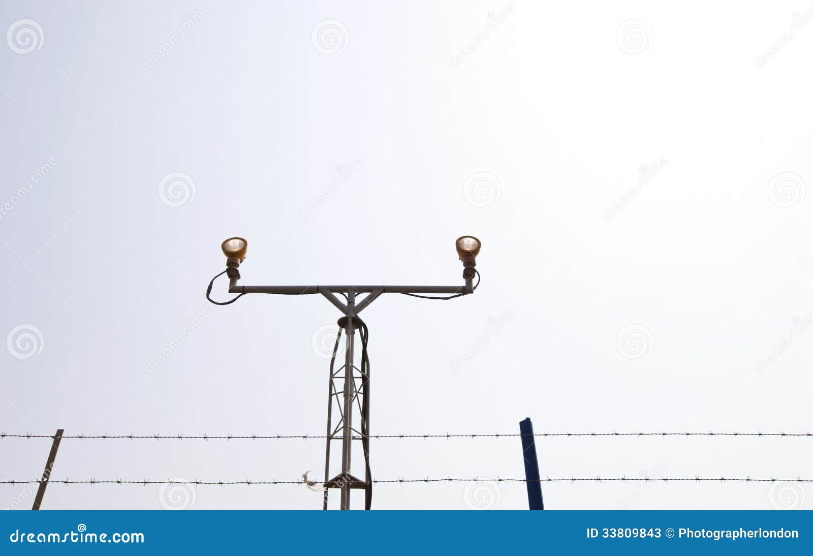 Lighting Equipment at the Start of Airport Runway Surrounded by Barb ...
