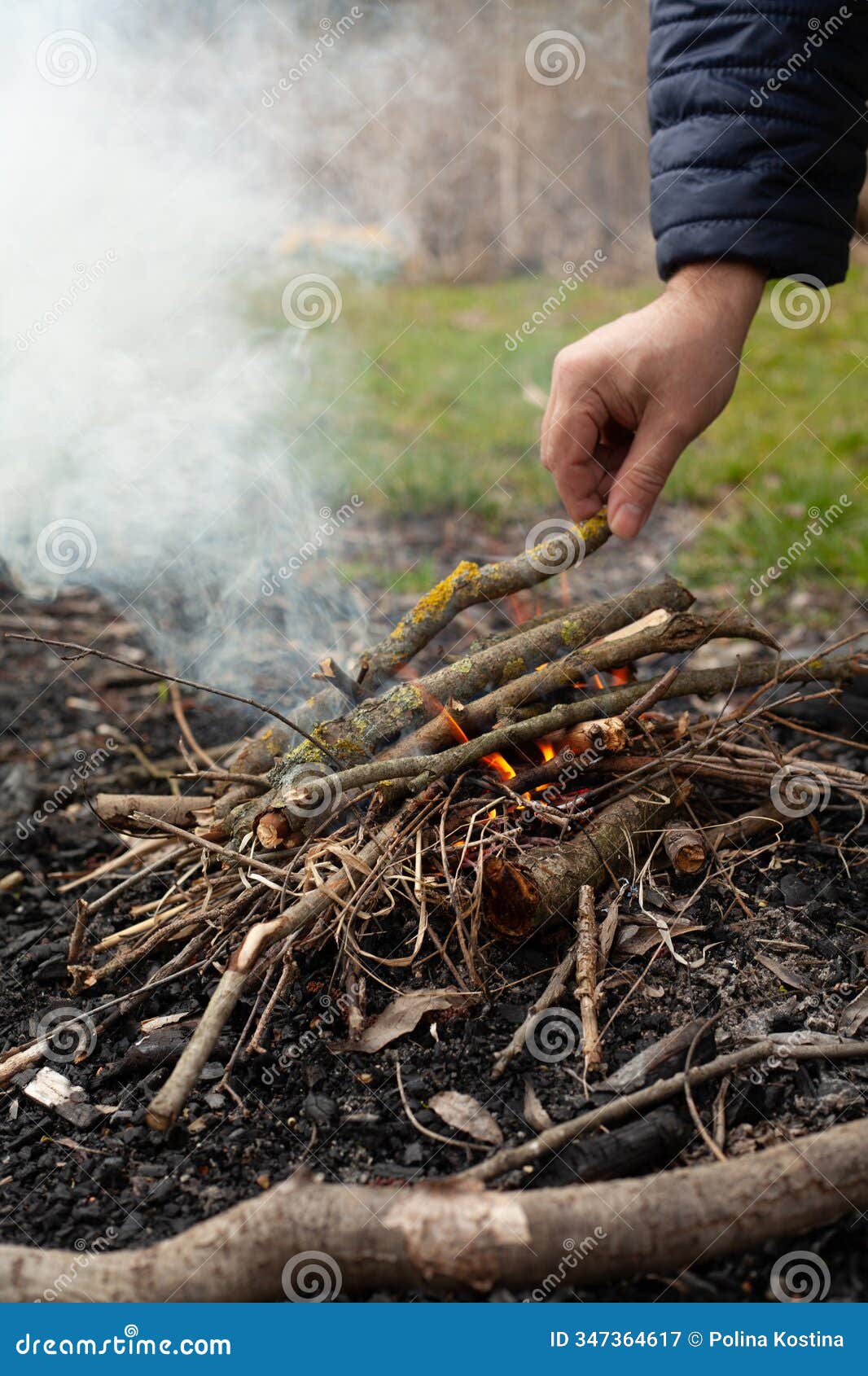 Man is Lighting a Fire in the Forest Stock Image - Image of flames ...