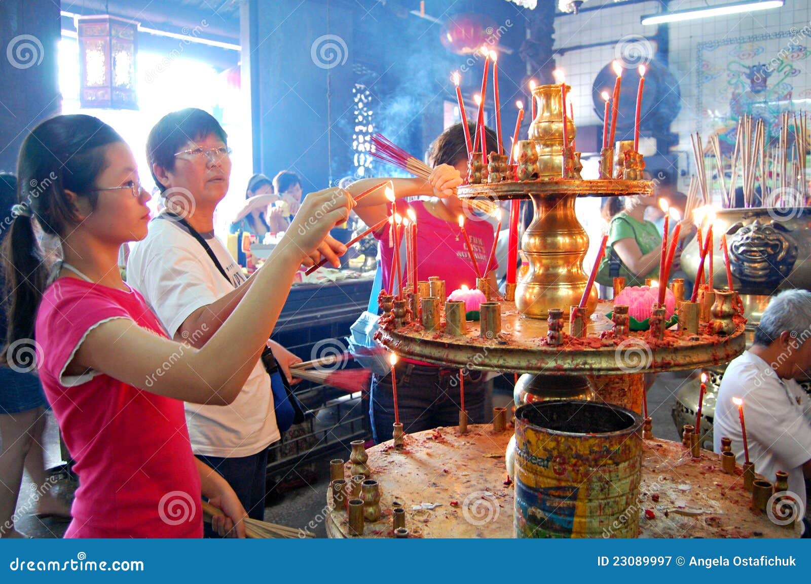 Lighting Joss Sticks editorial photography. Image of buddhist - 23089997