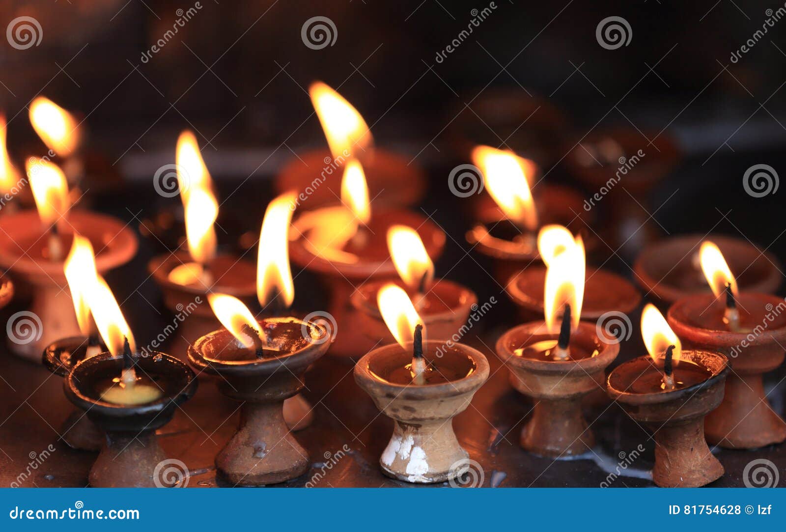 Lighting a lamp stock photo. Image of culture, prayer - 81754628