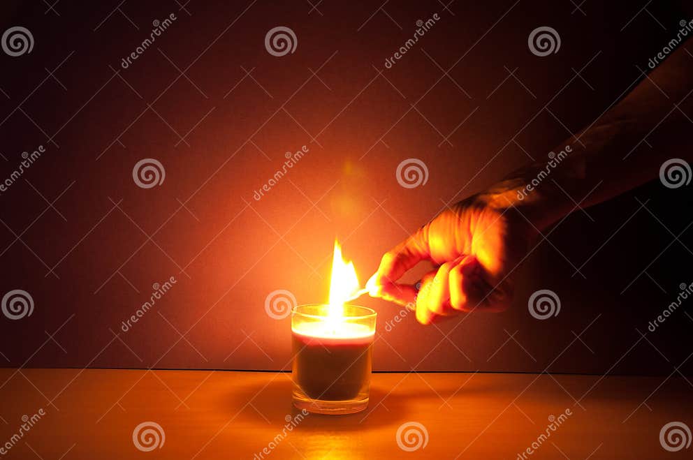 Lighting a Match Against a Black Background Stock Photo - Image of fire ...