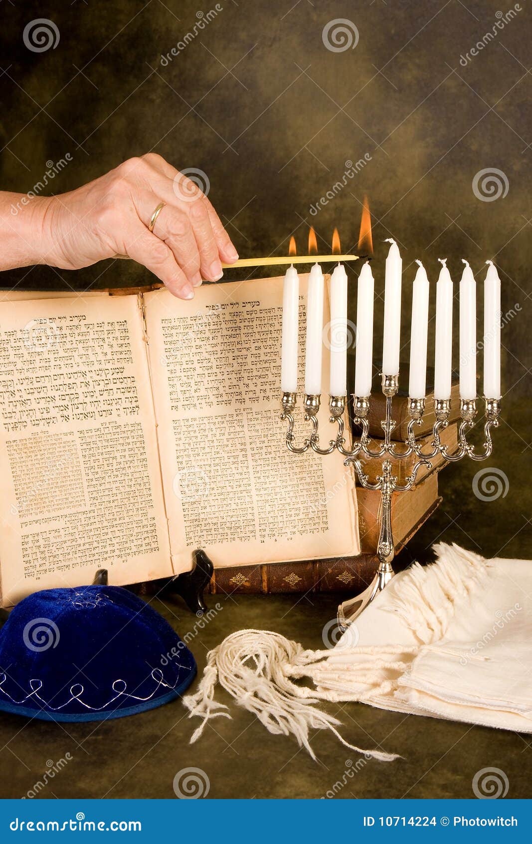 Lighting the menorah stock photo. Image of praying, candles - 10714224