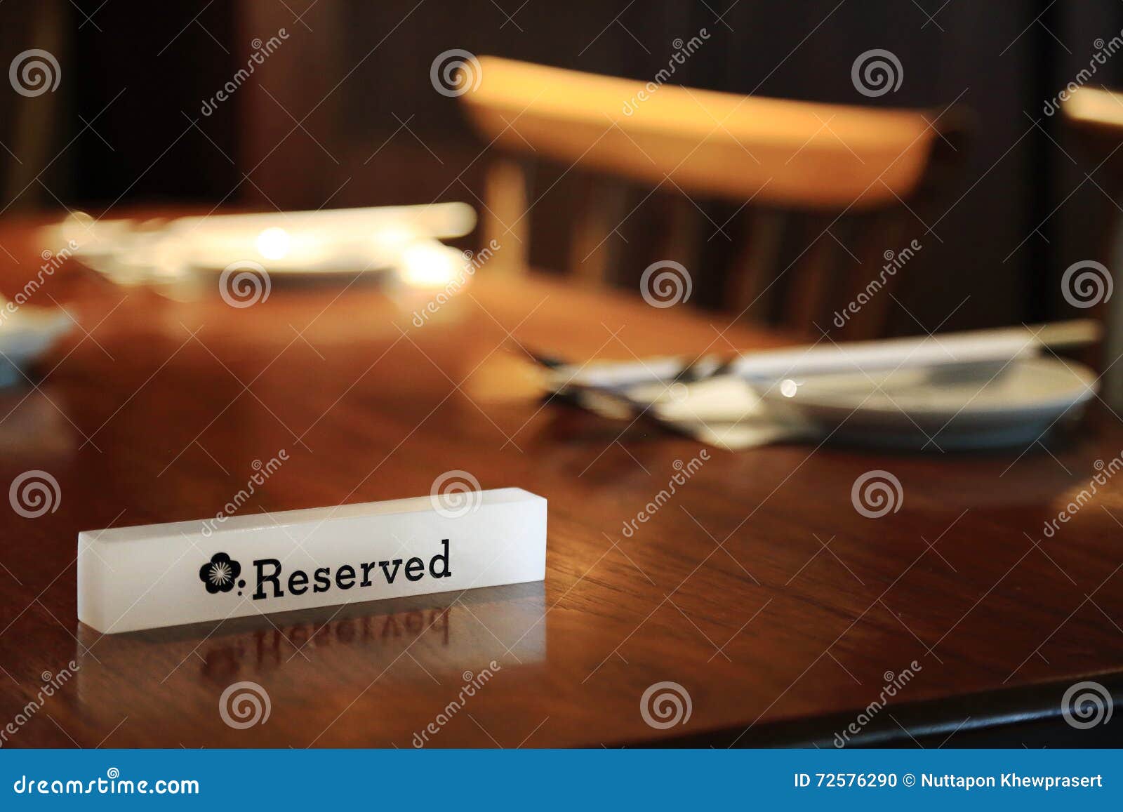 Lighting Reserved Sign on a Restaurant Table Stock Photo - Image of ...
