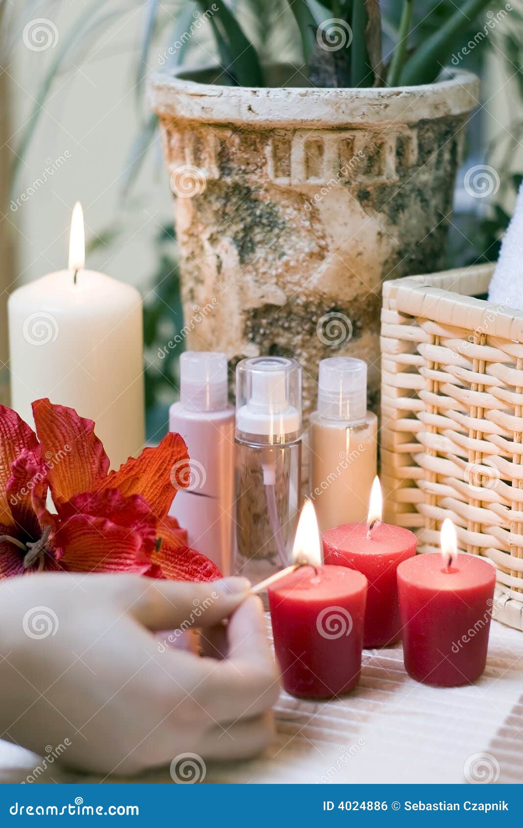 Lighting a spa candle stock photo. Image of life, health - 4024886