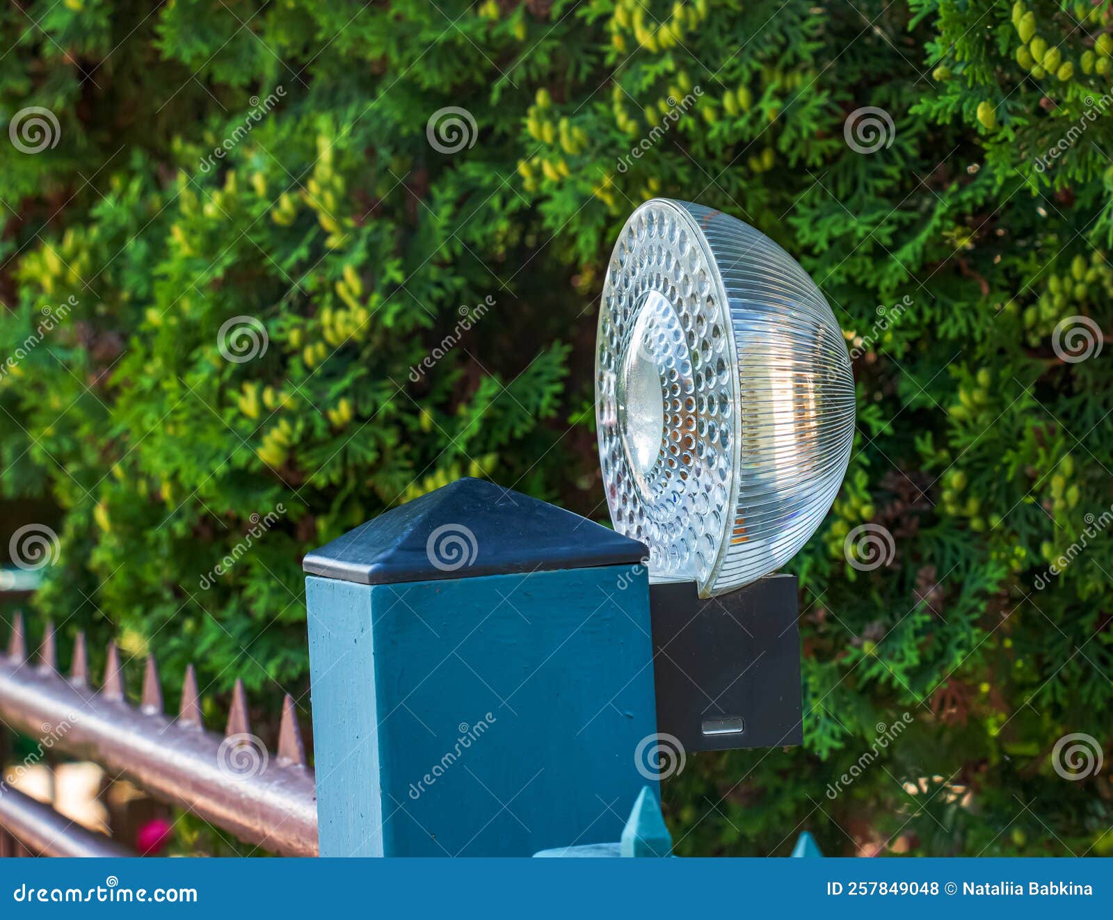 Lighting Spotlight on the Fence Post. Outdoor Lighting System Stock ...