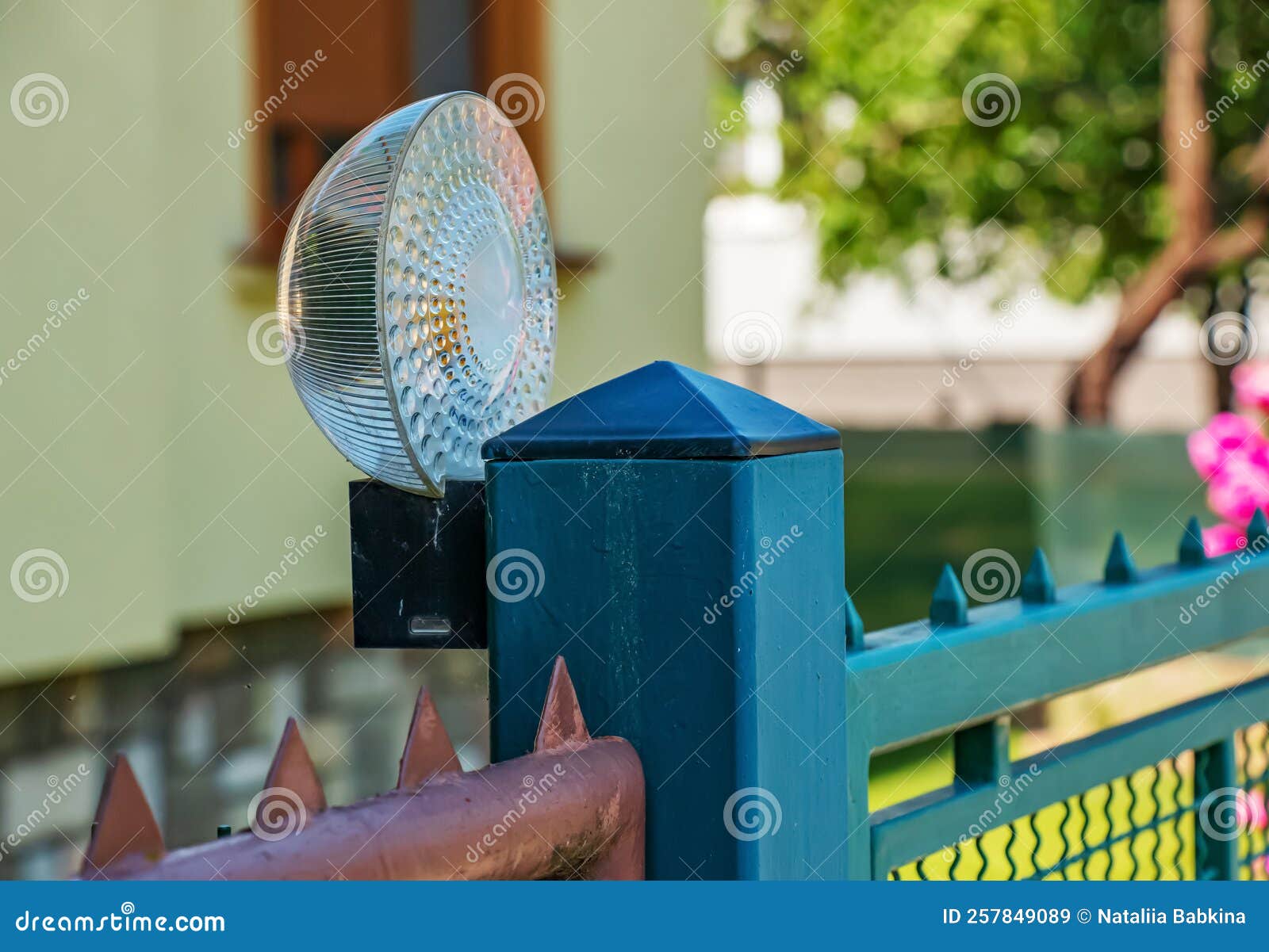 Lighting Spotlight on the Fence Post. Outdoor Lighting System Stock ...