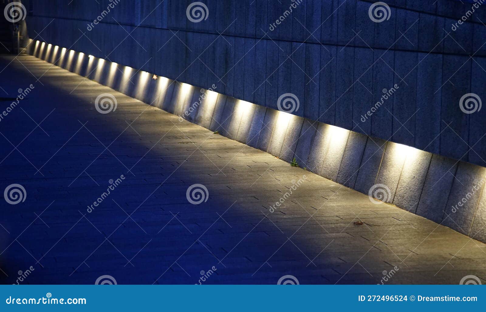 Lighting up the sidewalks stock photo. Image of line - 272496524