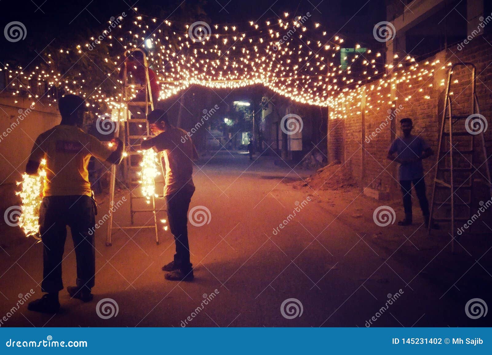 Lighting workers. editorial photography. Image of night - 145231402