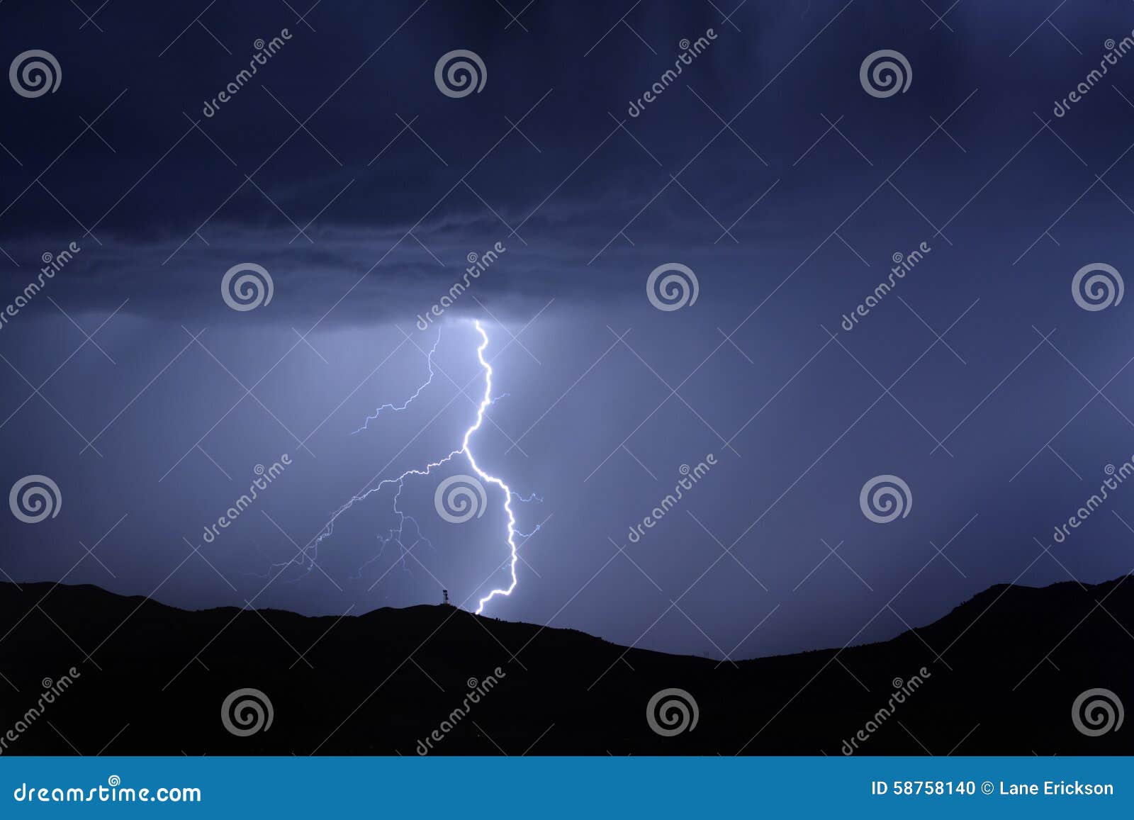 Lightning Bolt on Mountain with Radio Tower Stock Photo - Image of ...