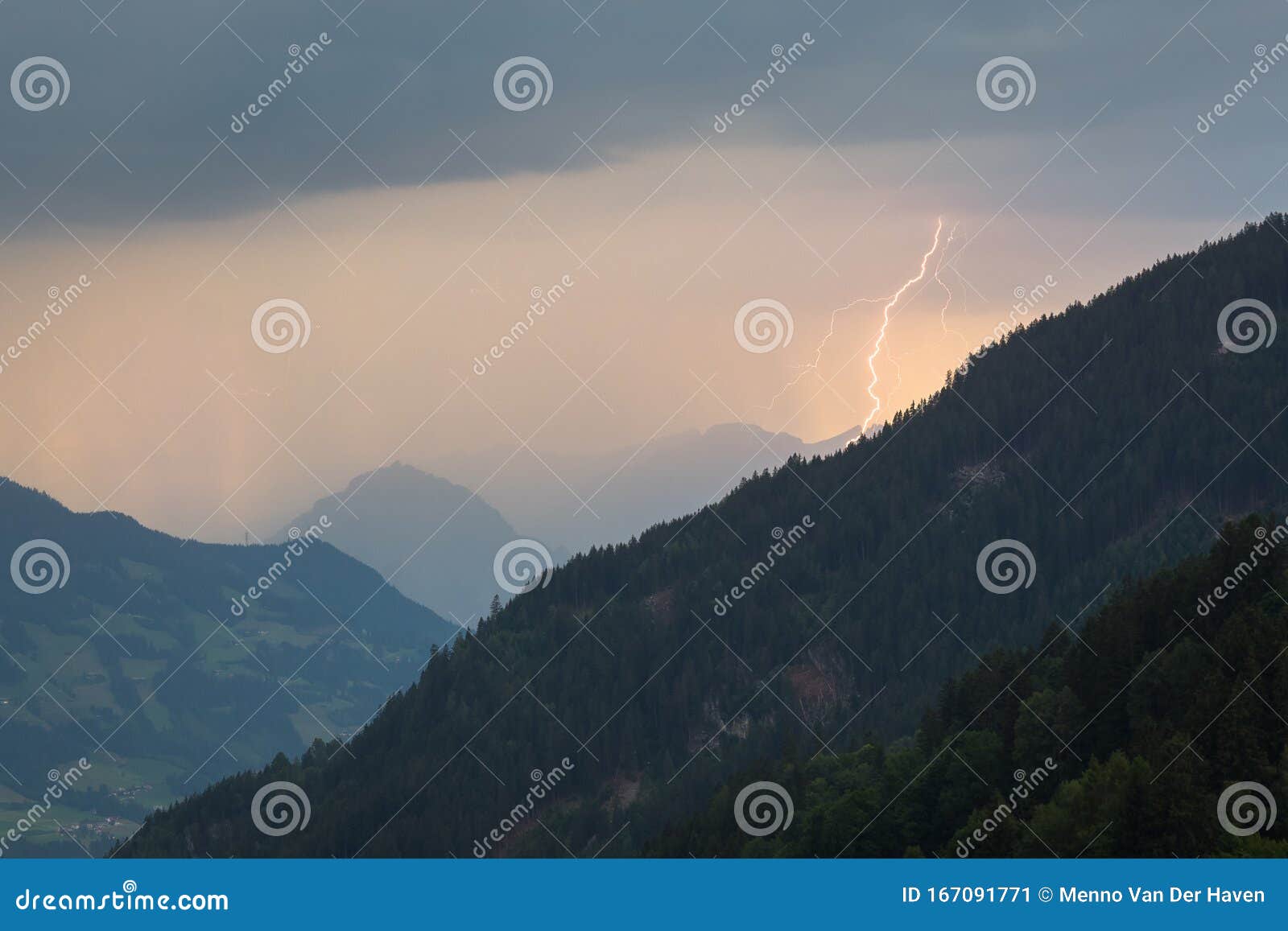 Lightning Bolt Strikes Down between the Mountains of the Alps, Europe ...