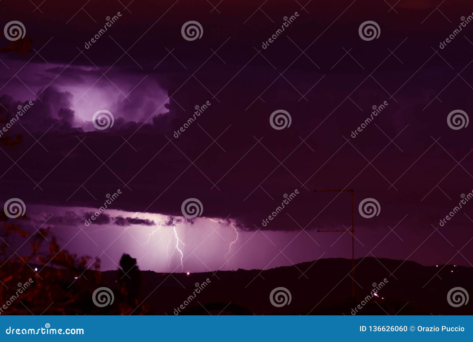 Lightning in the Distance between Thunder Storm Clouds Stock Photo ...