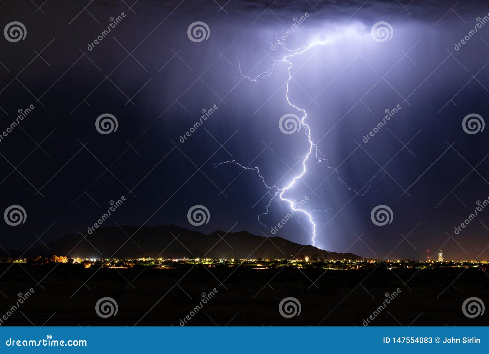 Lightning Over a City during a Thunderstorm Stock Image - Image of ...